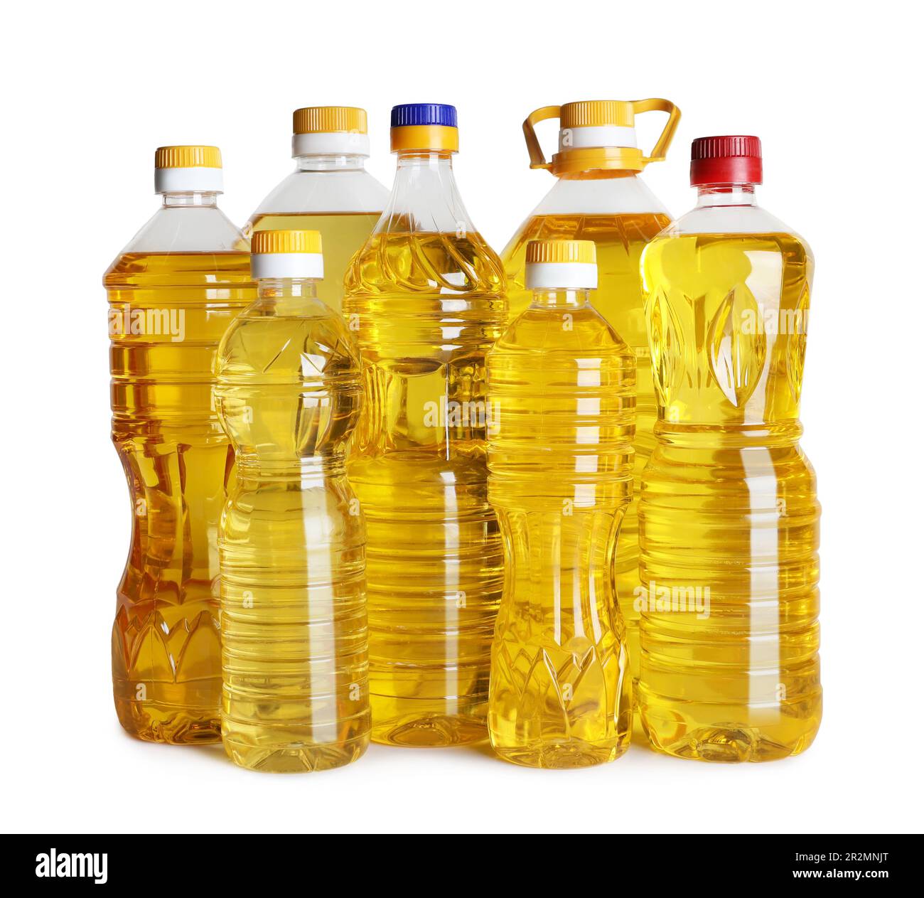 Bottles of cooking oil on white background Stock Photo - Alamy