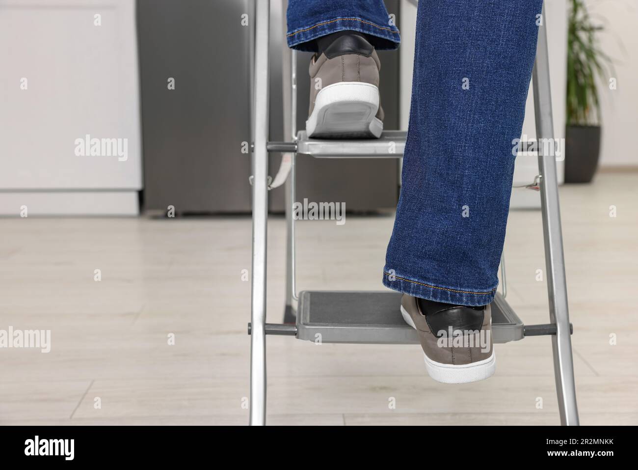 Man climbing metal structure hi-res stock photography and images - Alamy