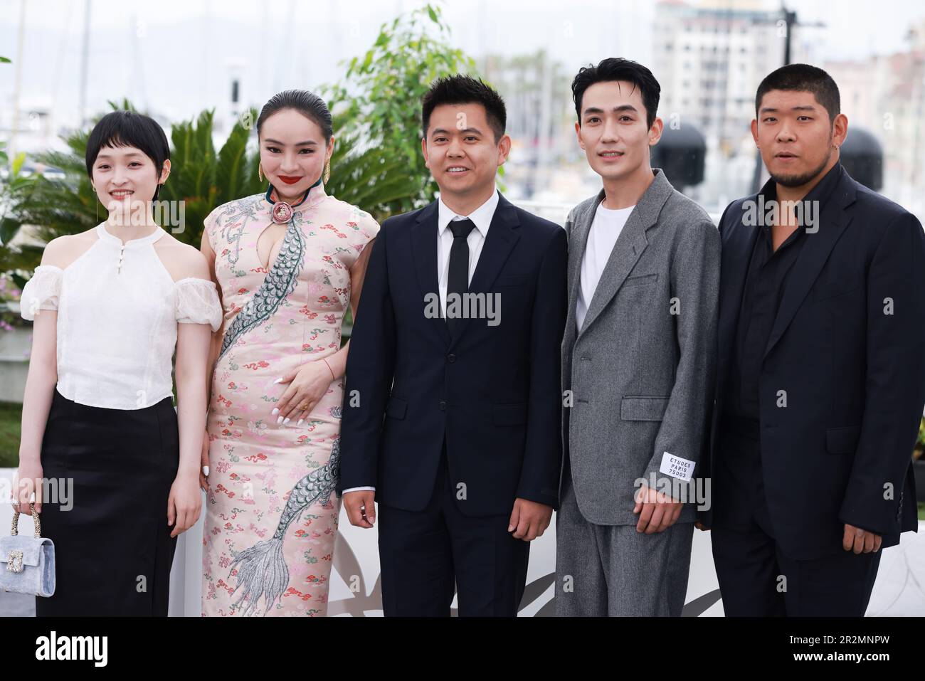 Cannes, France. 20th May, 2023. Chinese director Wei Shujun (C), actor ...
