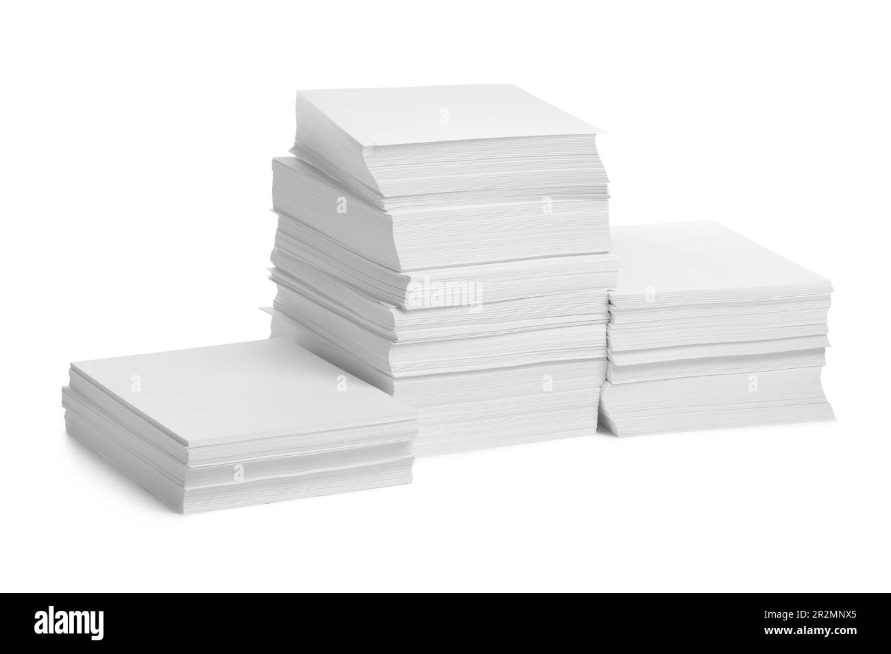 Stacks of paper sheets on white background Stock Photo - Alamy