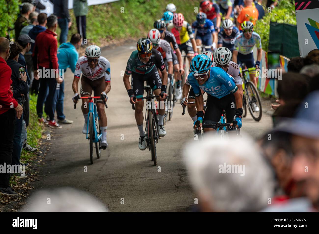 Italy, May 13, 2023: professional cyclists face the eighth stage of the ...