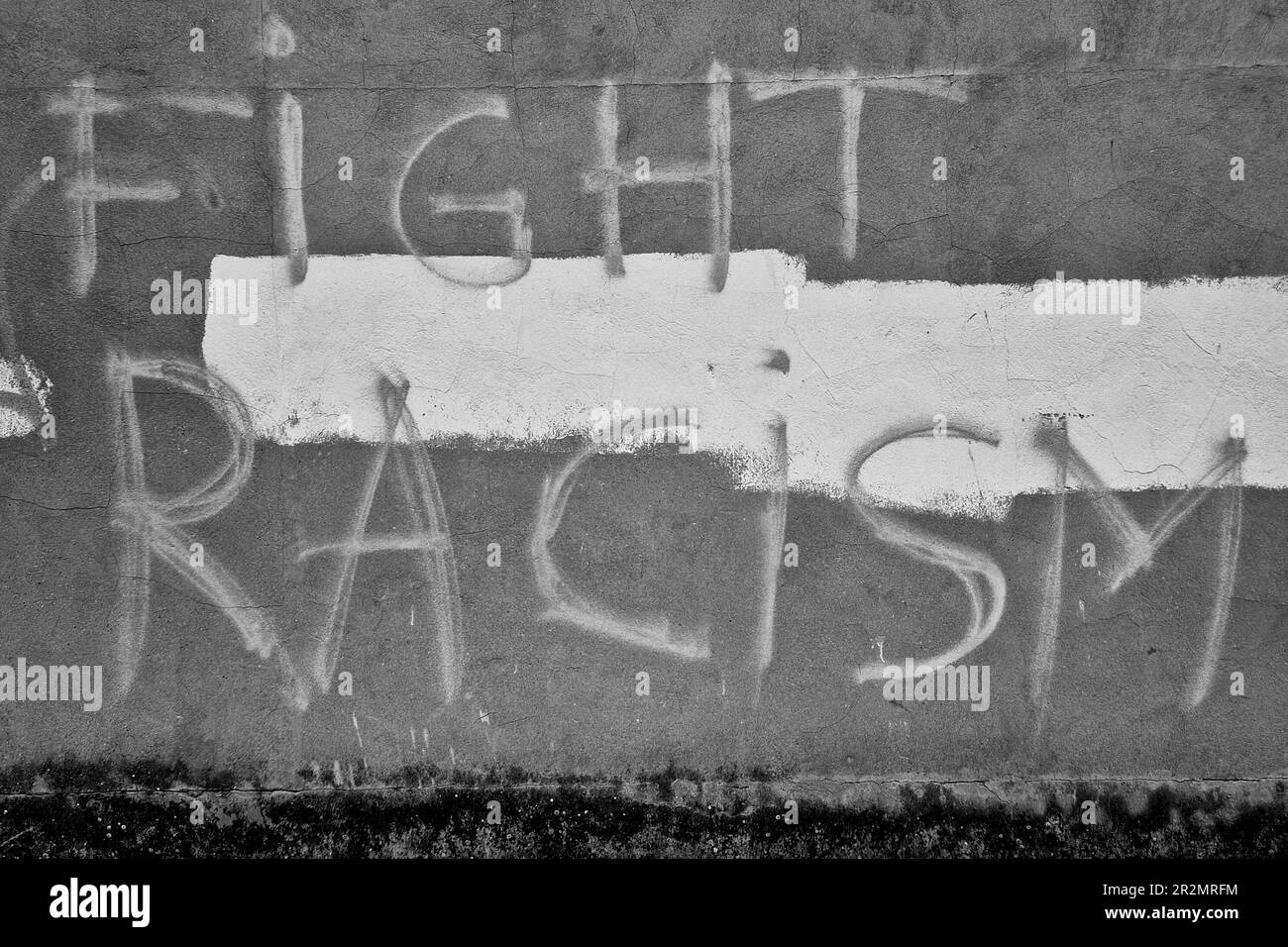 Graffiti reading "Fight racism", Illustration, France Stock Photo - Alamy
