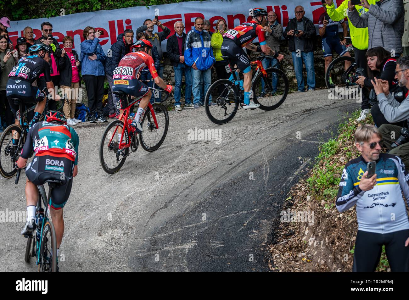 Italy, May 13, 2023: professional cyclists face the eighth stage of the ...