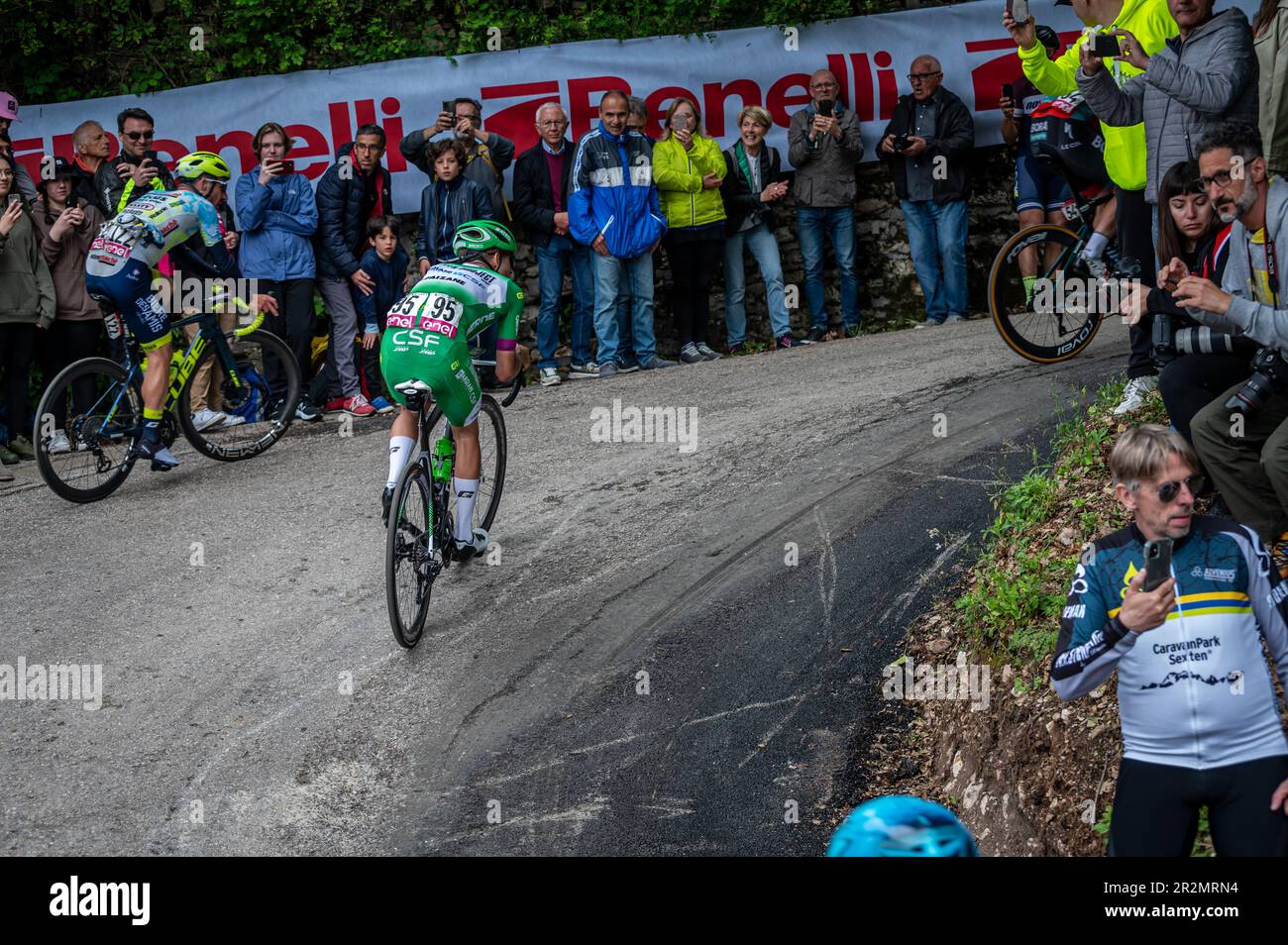 Italy, May 13, 2023: professional cyclists face the eighth stage of the ...