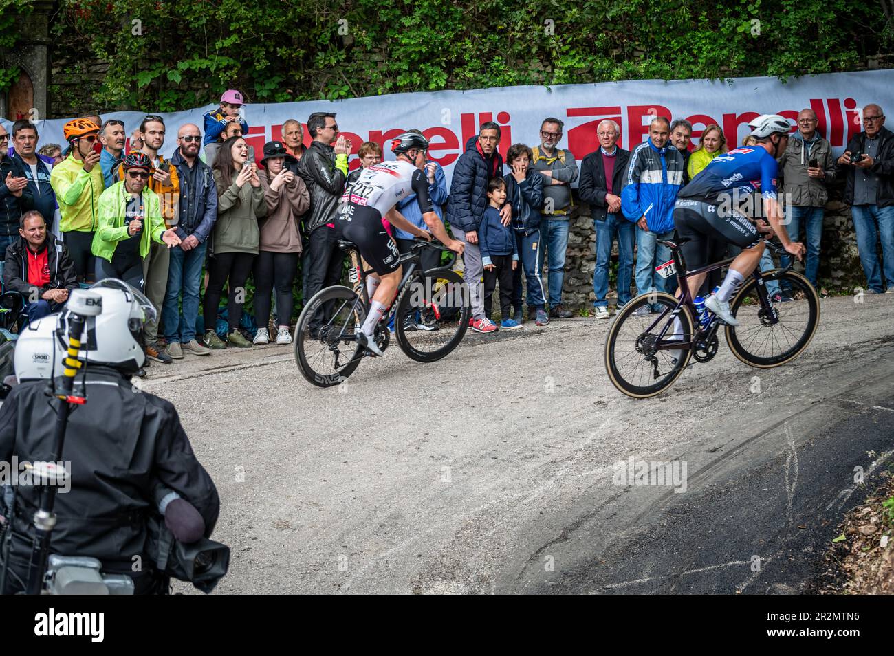 Italy, May 13, 2023: professional cyclists face the eighth stage of the ...