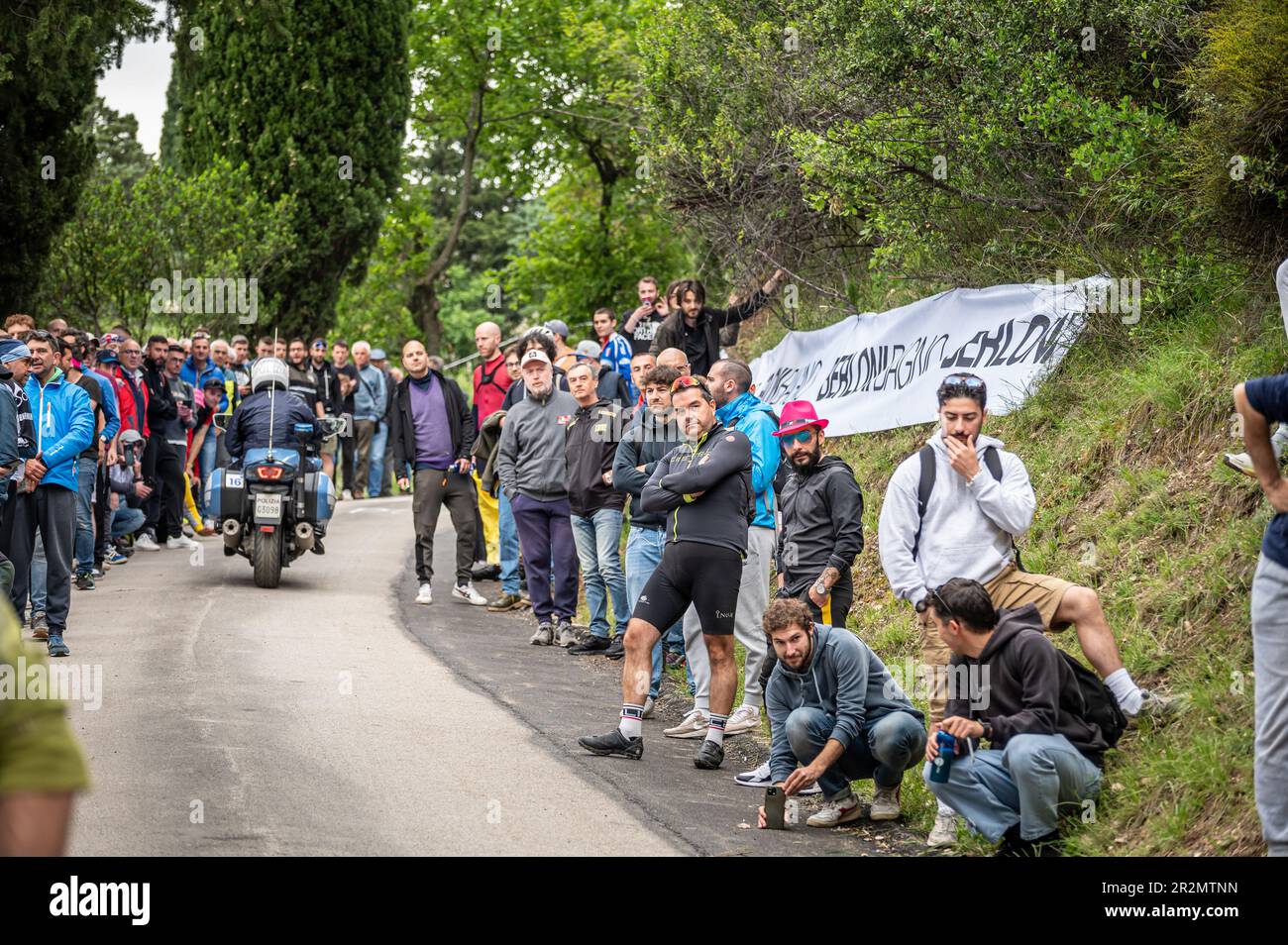 Italy, May 13, 2023: professional cyclists face the eighth stage of the ...