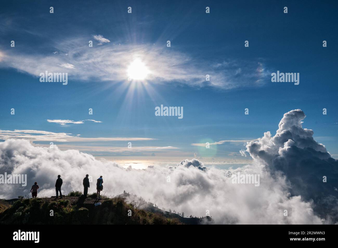 Sun above clouds at Senaru crater rim camp, Lombok, Indonesia Stock ...