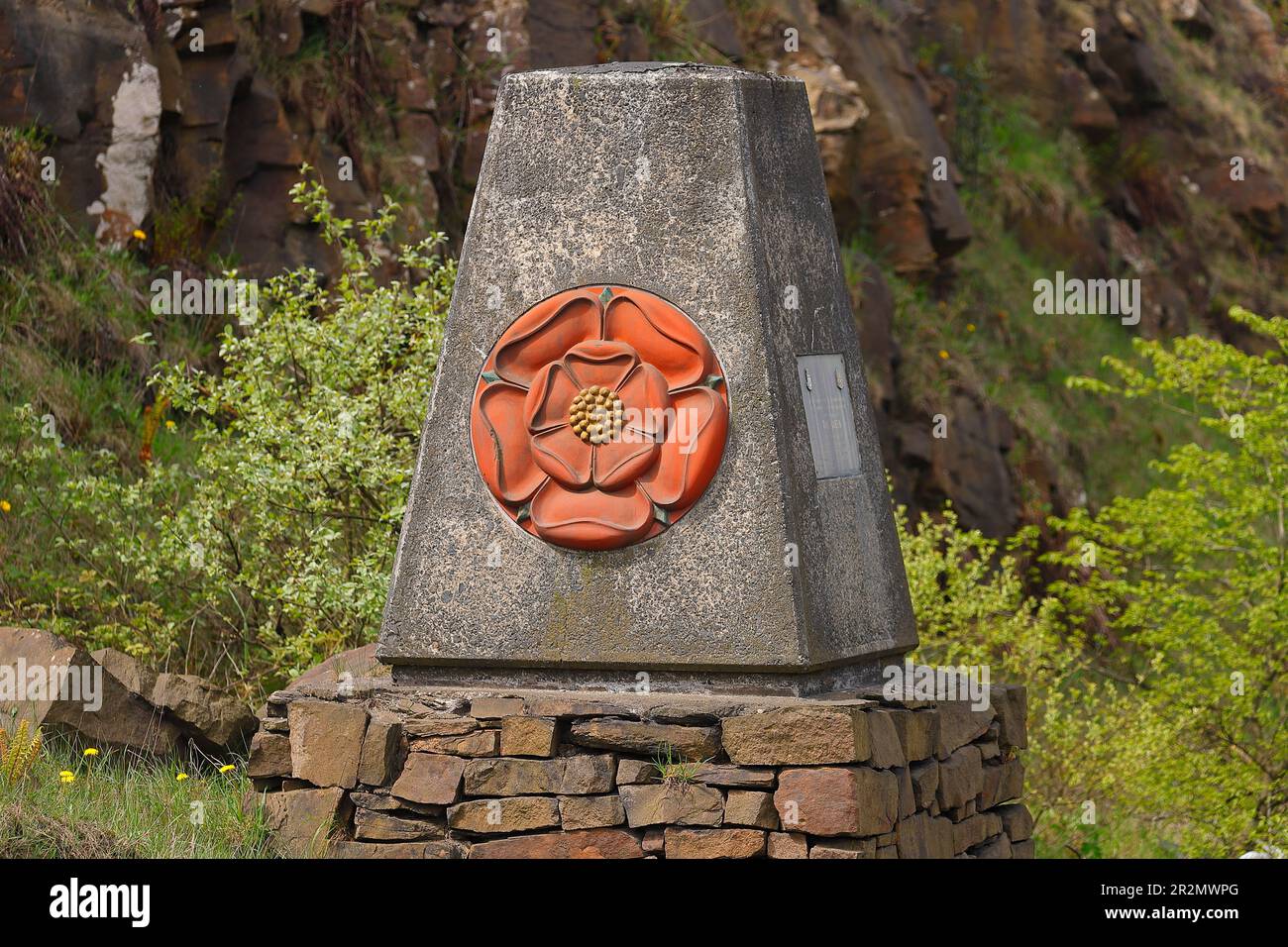 Red Rose of Lancashire on a concrete pillar by the M62 on the border of ...