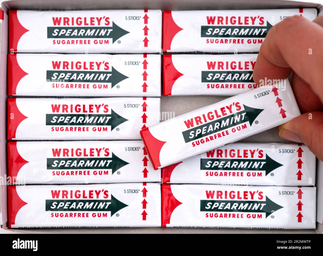 Tambov, Russian Federation - May 12, 2023 A person taking a pack of ...