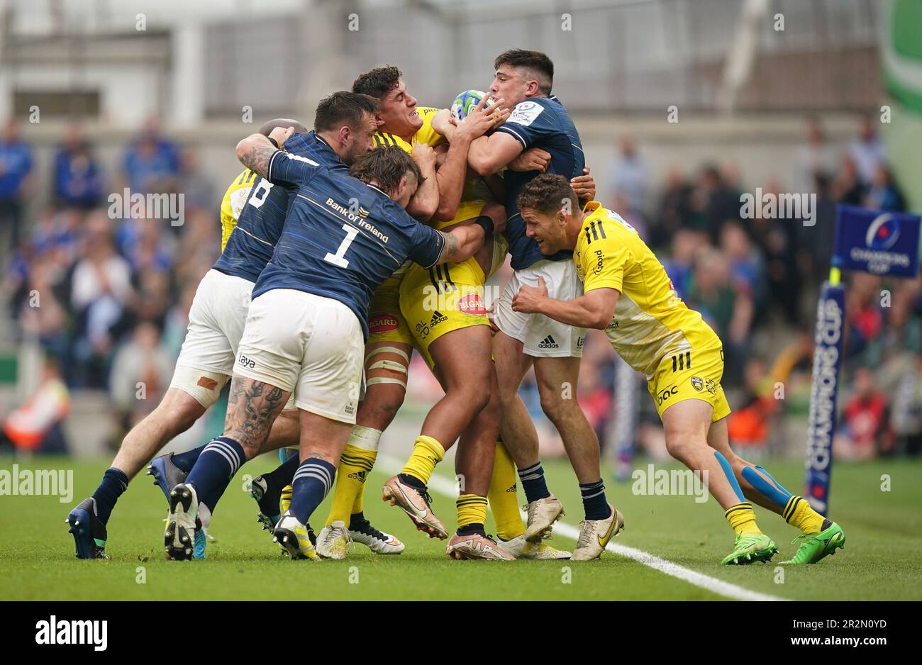 Jimmy O'Brien (second right) is tackled by La Rochelle's Paul Boudehent ...