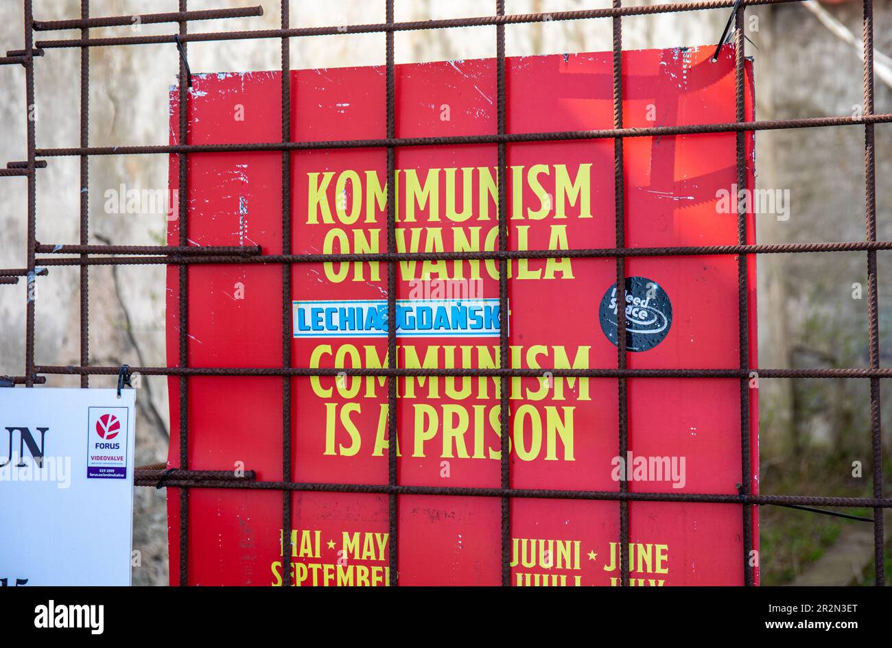 Kommunism on vangla. Communism is a prison. Poster or banner hanging at ...