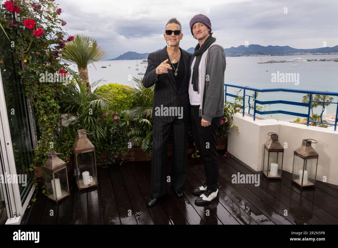 Robbie Williams, left, and director Michael Gracey pose for portrait ...