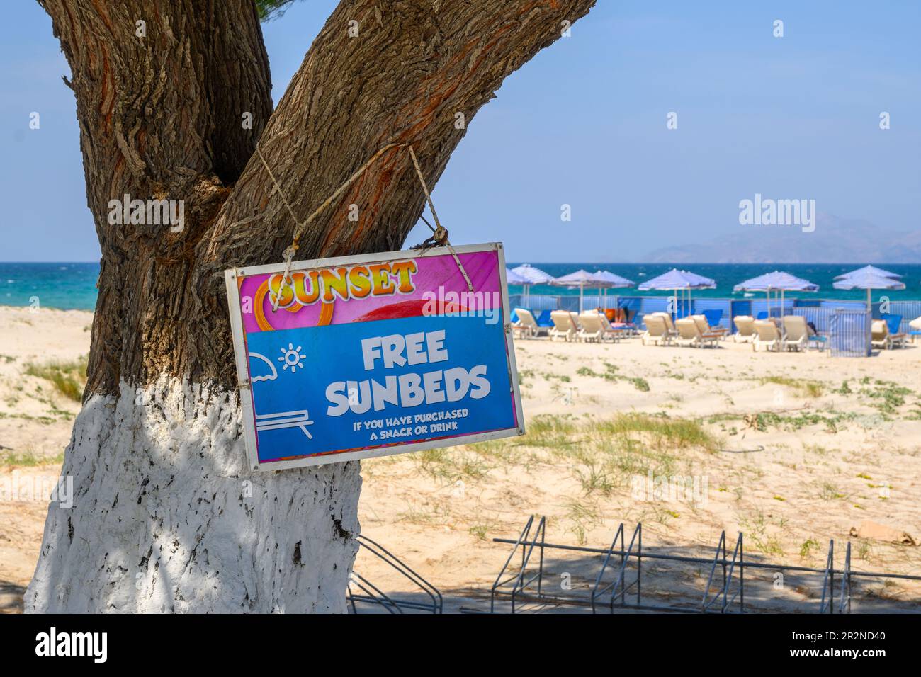 Kos, Greece - May 7, 2023: Sunbeds on the Marmari beach.The Greek ...