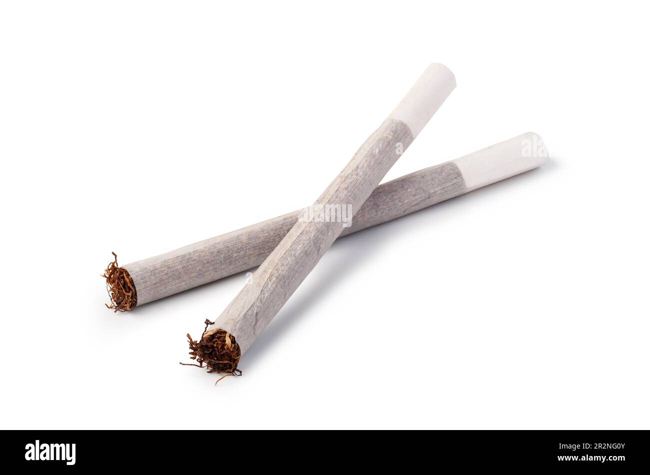 Hand rolled cigarettes on a white Stock Photo - Alamy