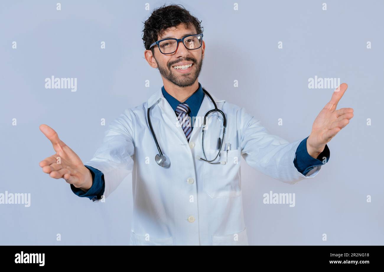 Doctor smiling with open arms welcoming. Friendly doctor hugging the ...