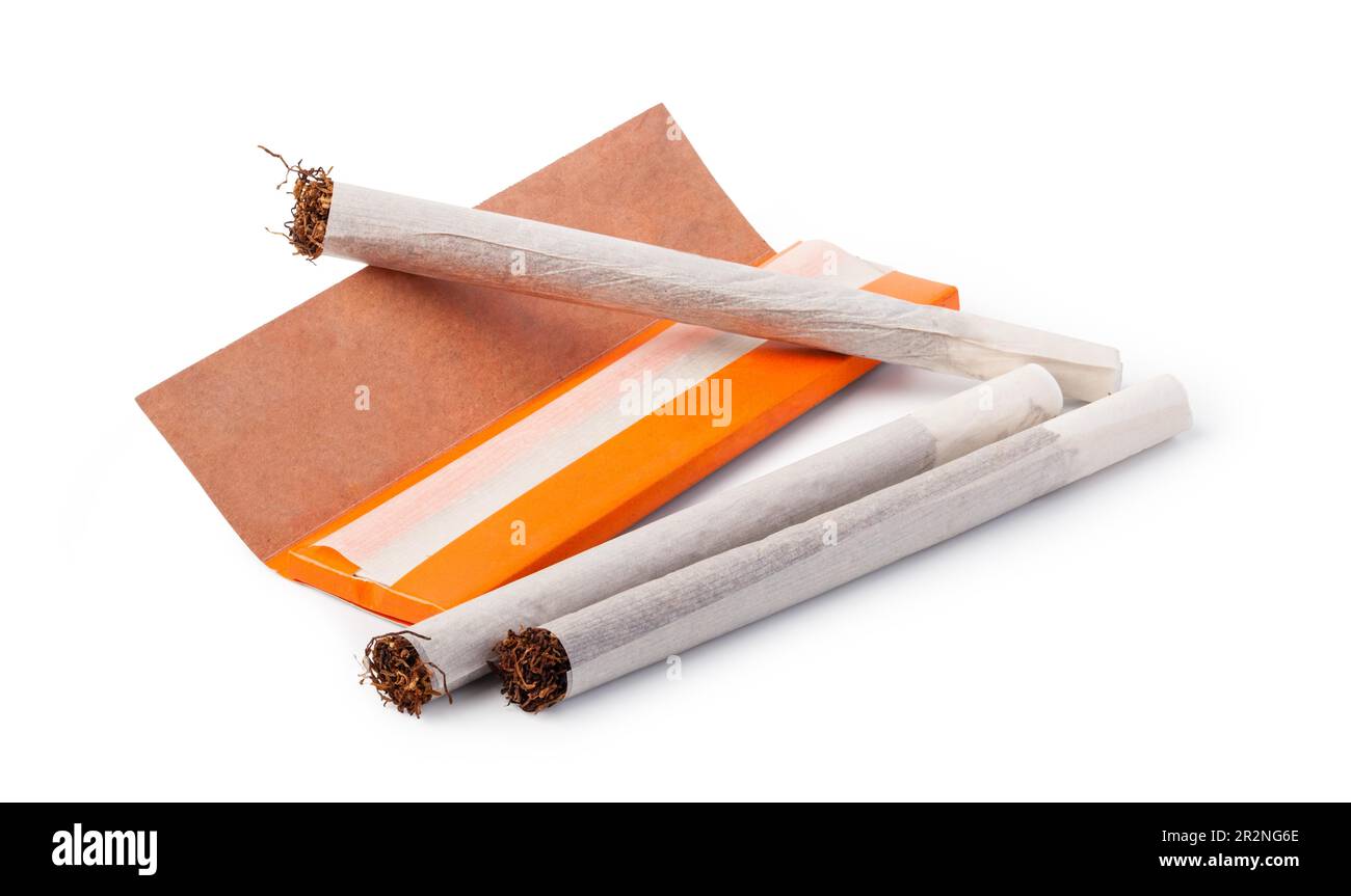 Hand rolled cigarettes on a white Stock Photo - Alamy