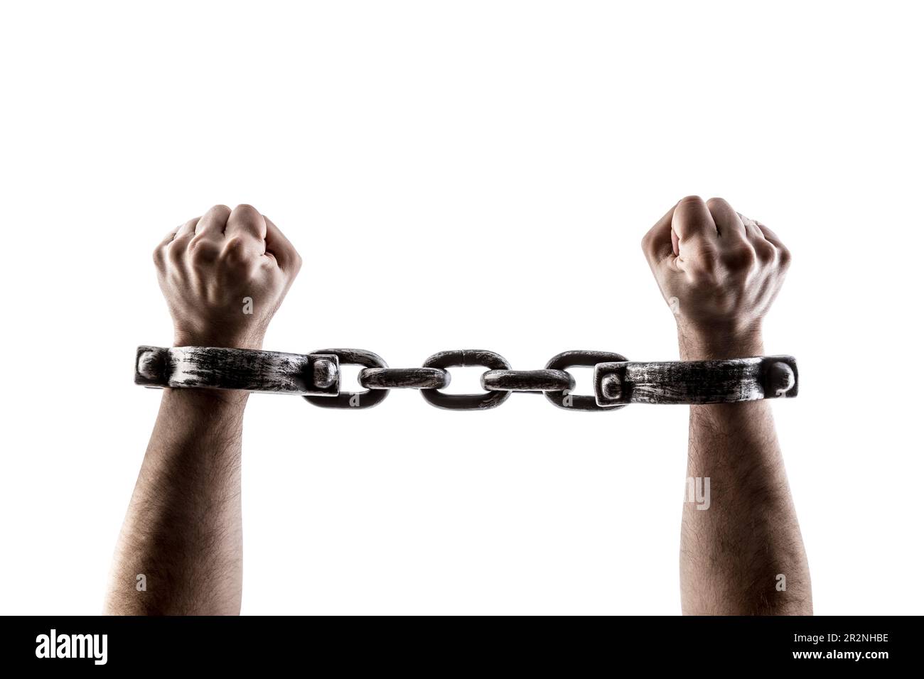 Shackled hands isolated on white background with clipping path Stock ...