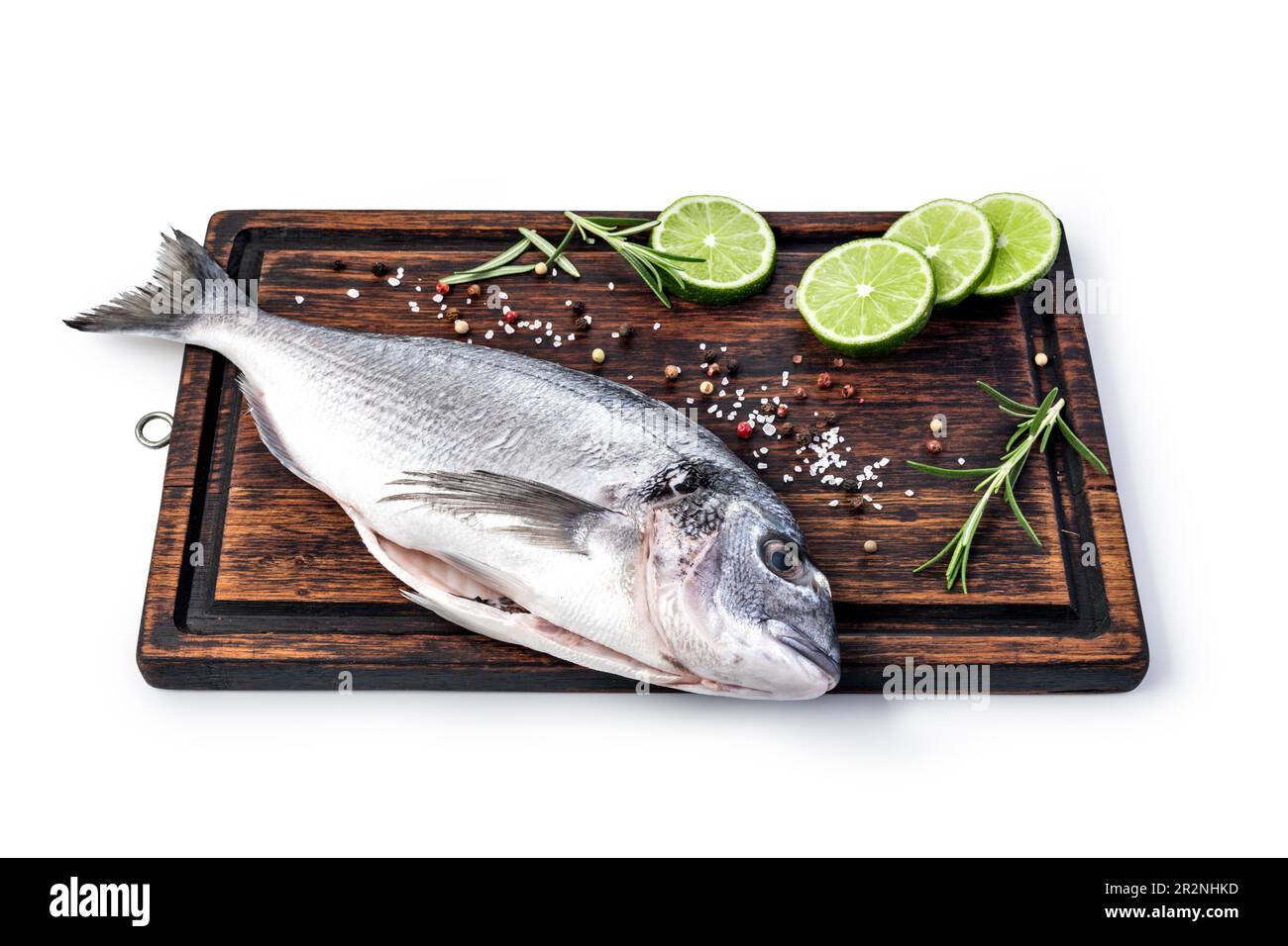 fresh dorado fish isolated on white background Stock Photo - Alamy