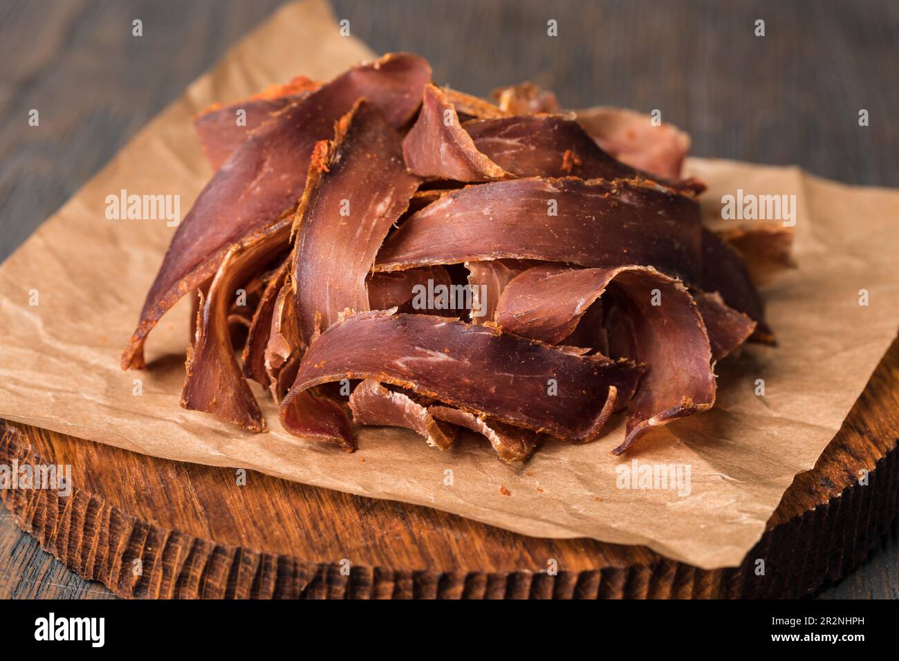 beef jerky and spice on old table Stock Photo - Alamy