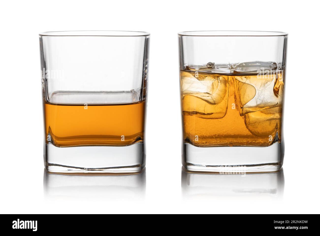 iGlass of whisky and ice isolated white background Stock Photo - Alamy