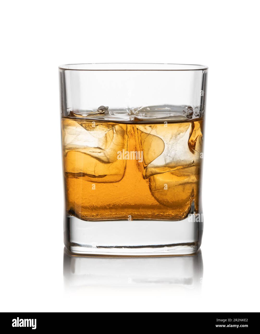 iGlass of whisky and ice isolated white background Stock Photo - Alamy