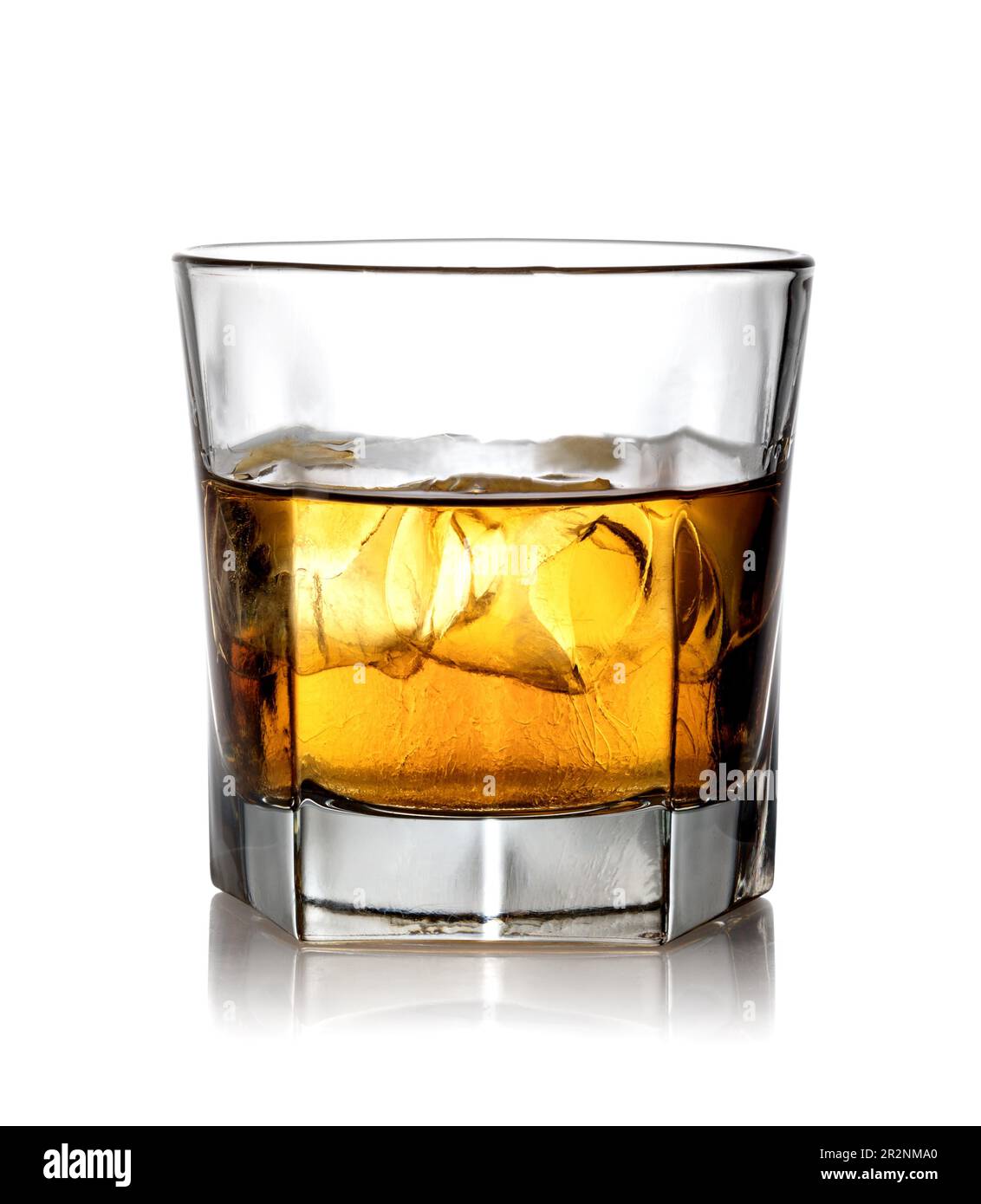 Glass of scotch whiskey and ice on a white background Stock Photo - Alamy