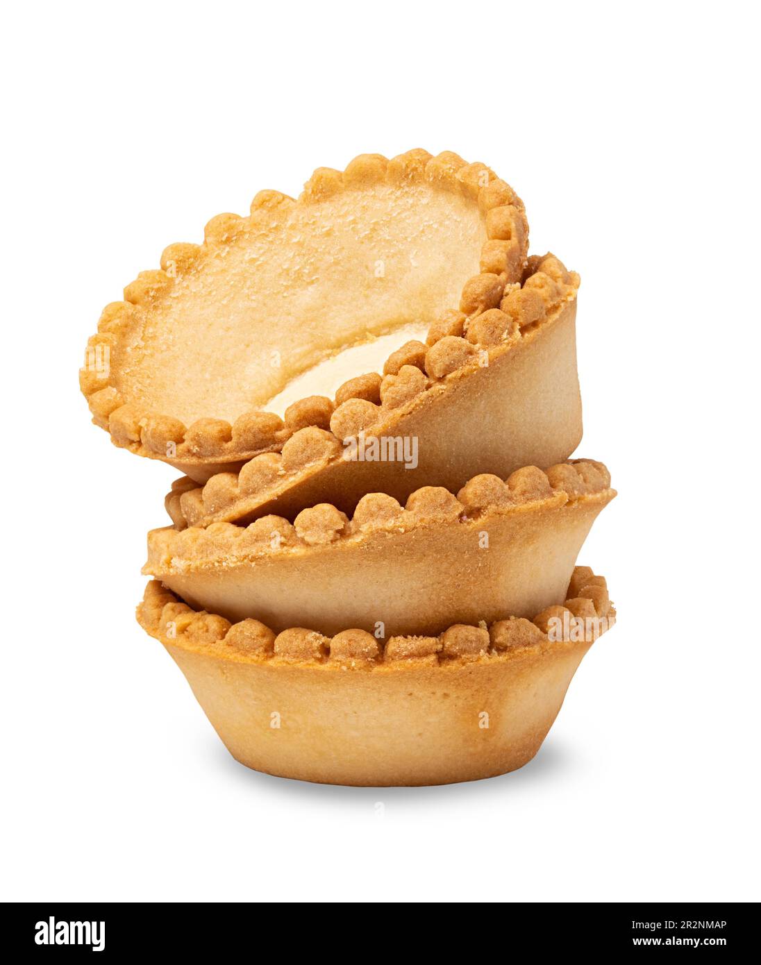 empty tartlets isolated on white background Stock Photo - Alamy