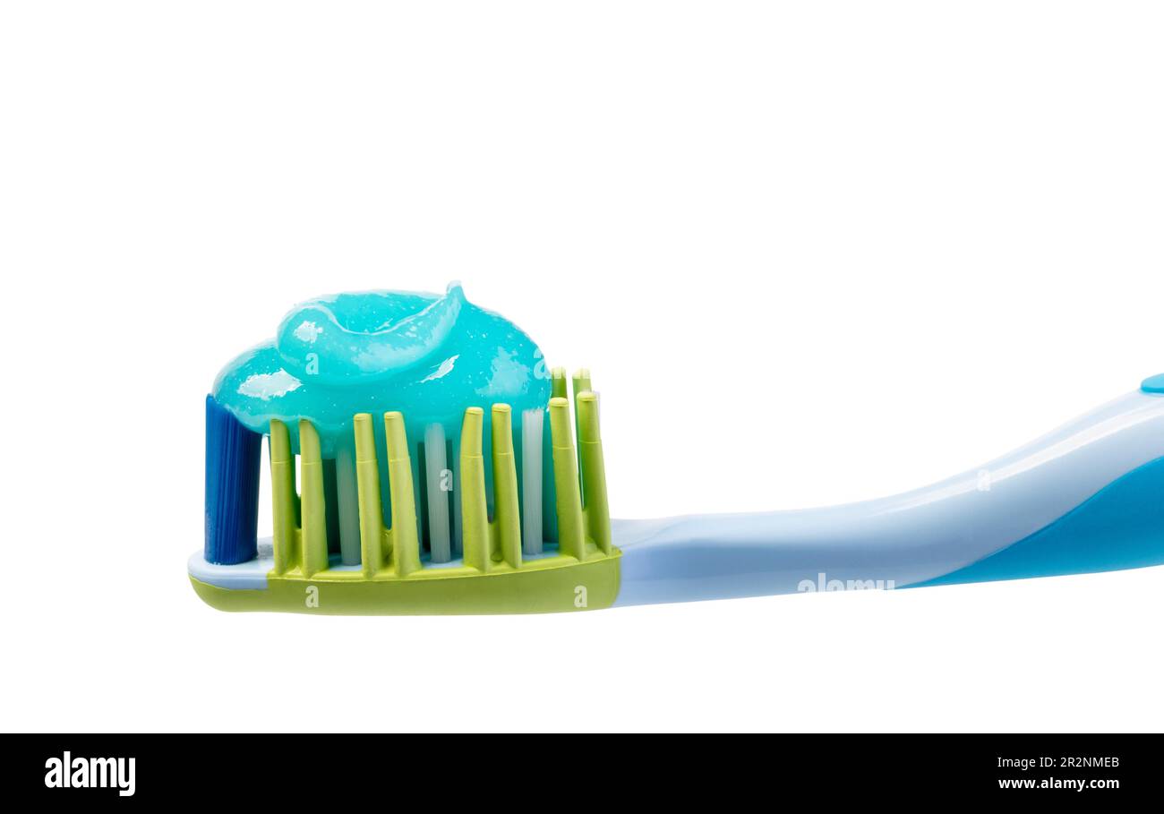 Toothbrush and toothpaste on white background Stock Photo - Alamy