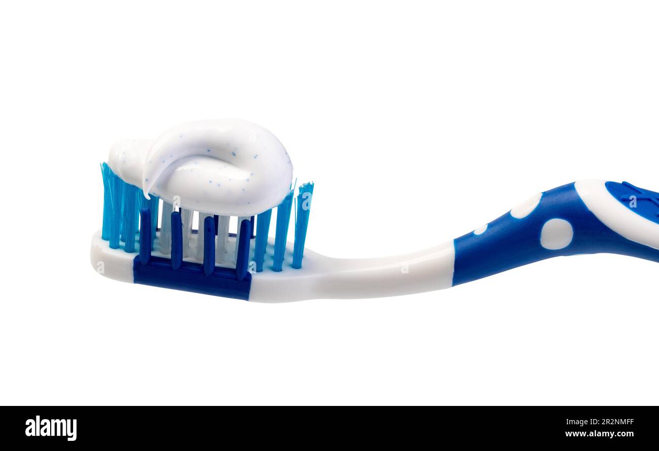 Toothbrush and toothpaste on white background Stock Photo - Alamy