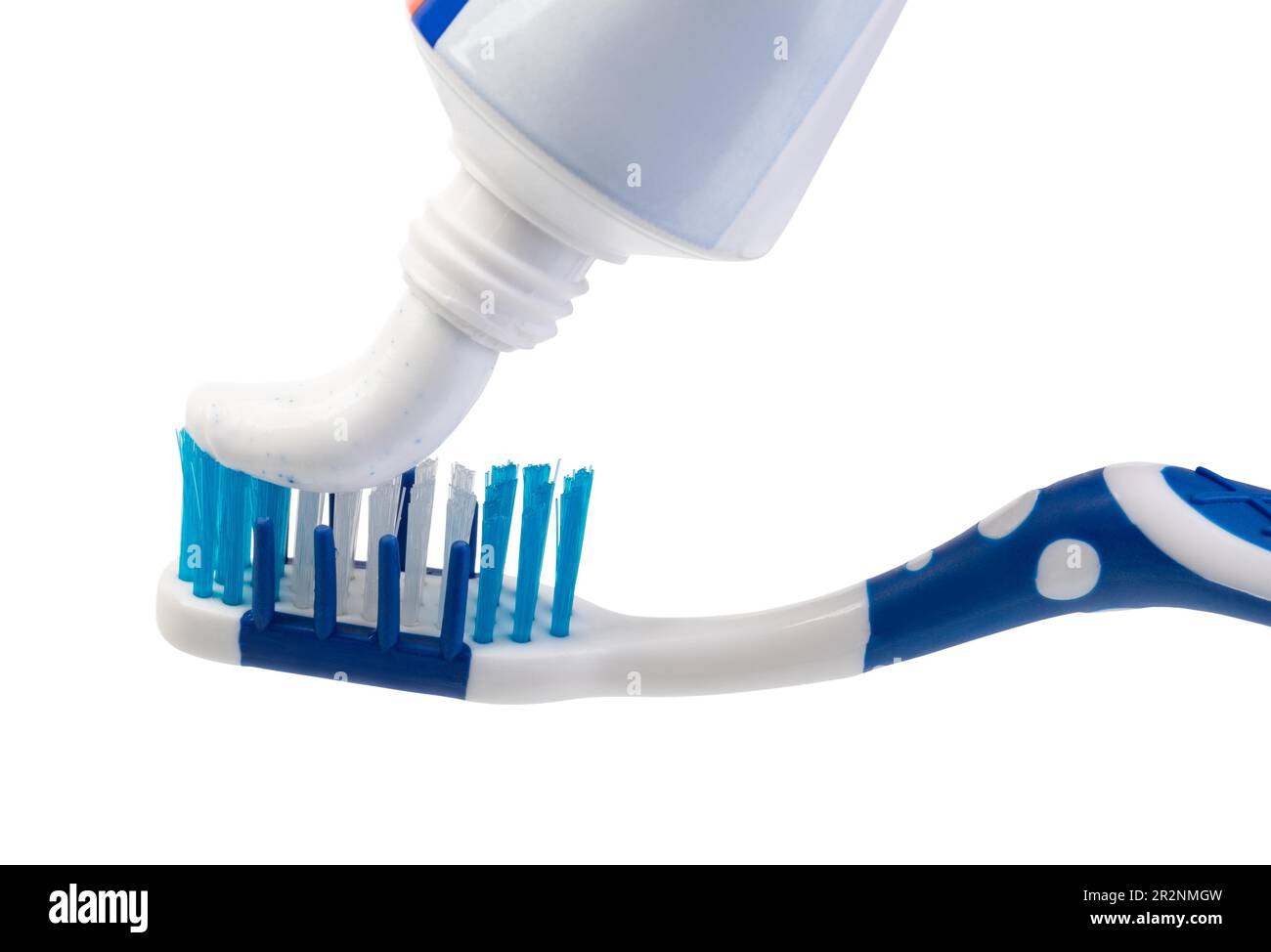 Toothbrush and toothpaste on white background Stock Photo - Alamy