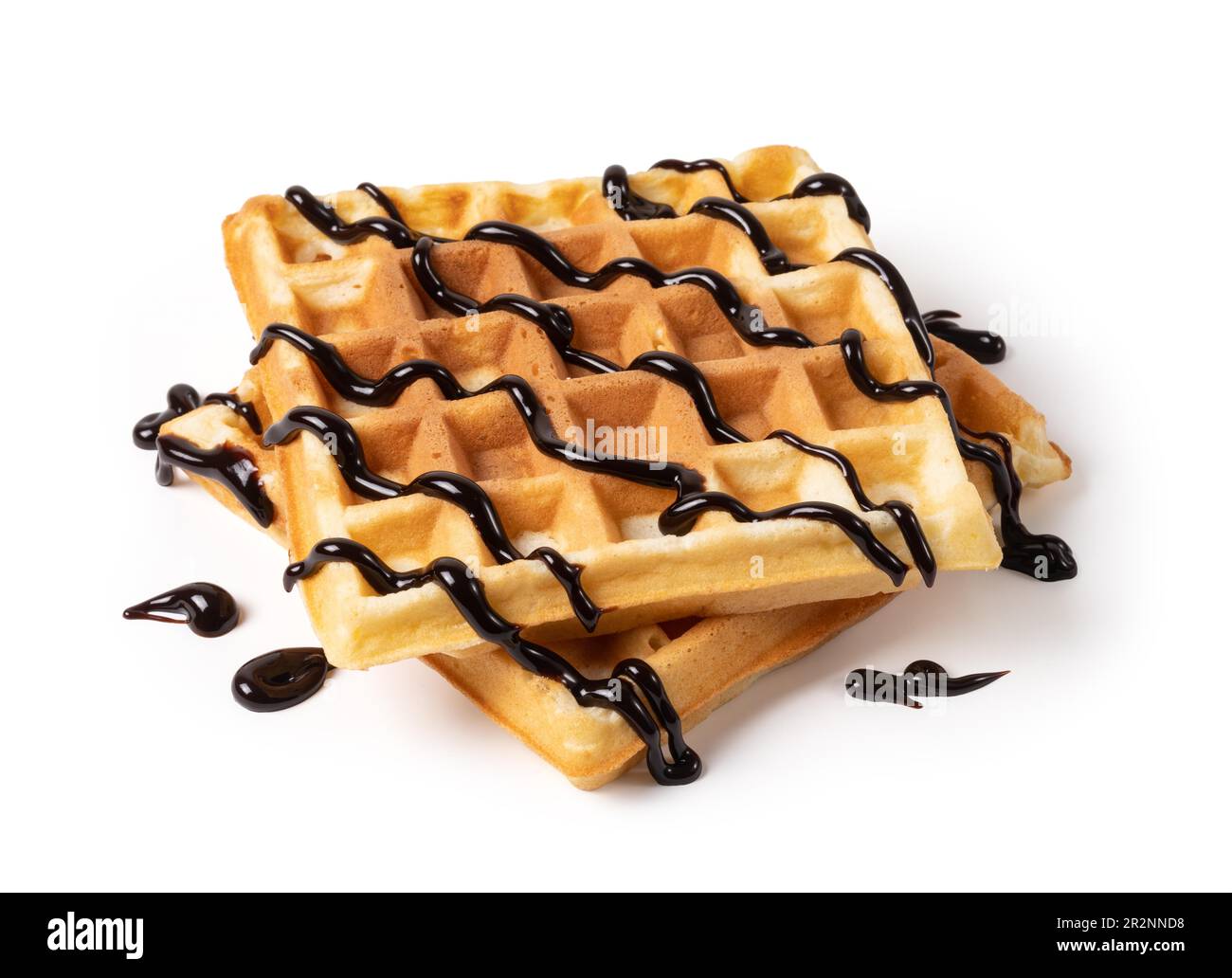 viennese waffles with chocolate syrup isolated on white background ...