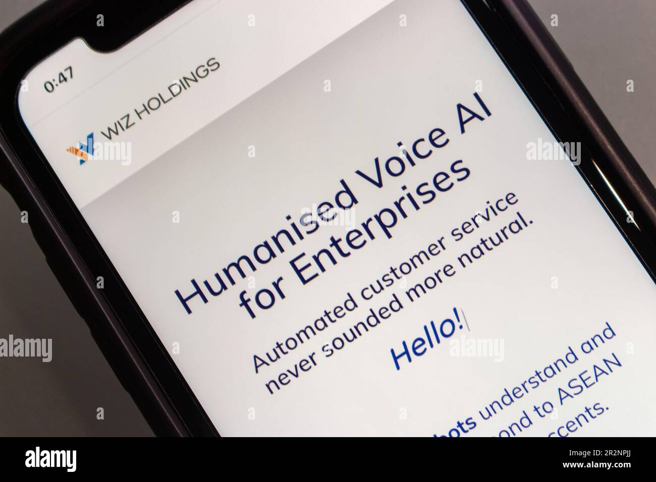 Wiz AI website in iPhone. Wiz AI is a platform specialized in analysing ...