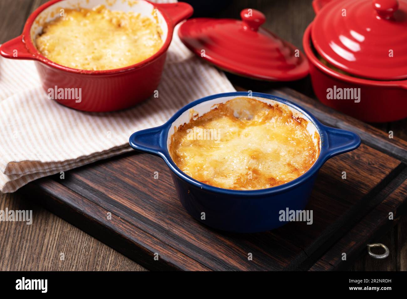 Baked mushroom julienne with chicken and cheese in pots Stock Photo - Alamy