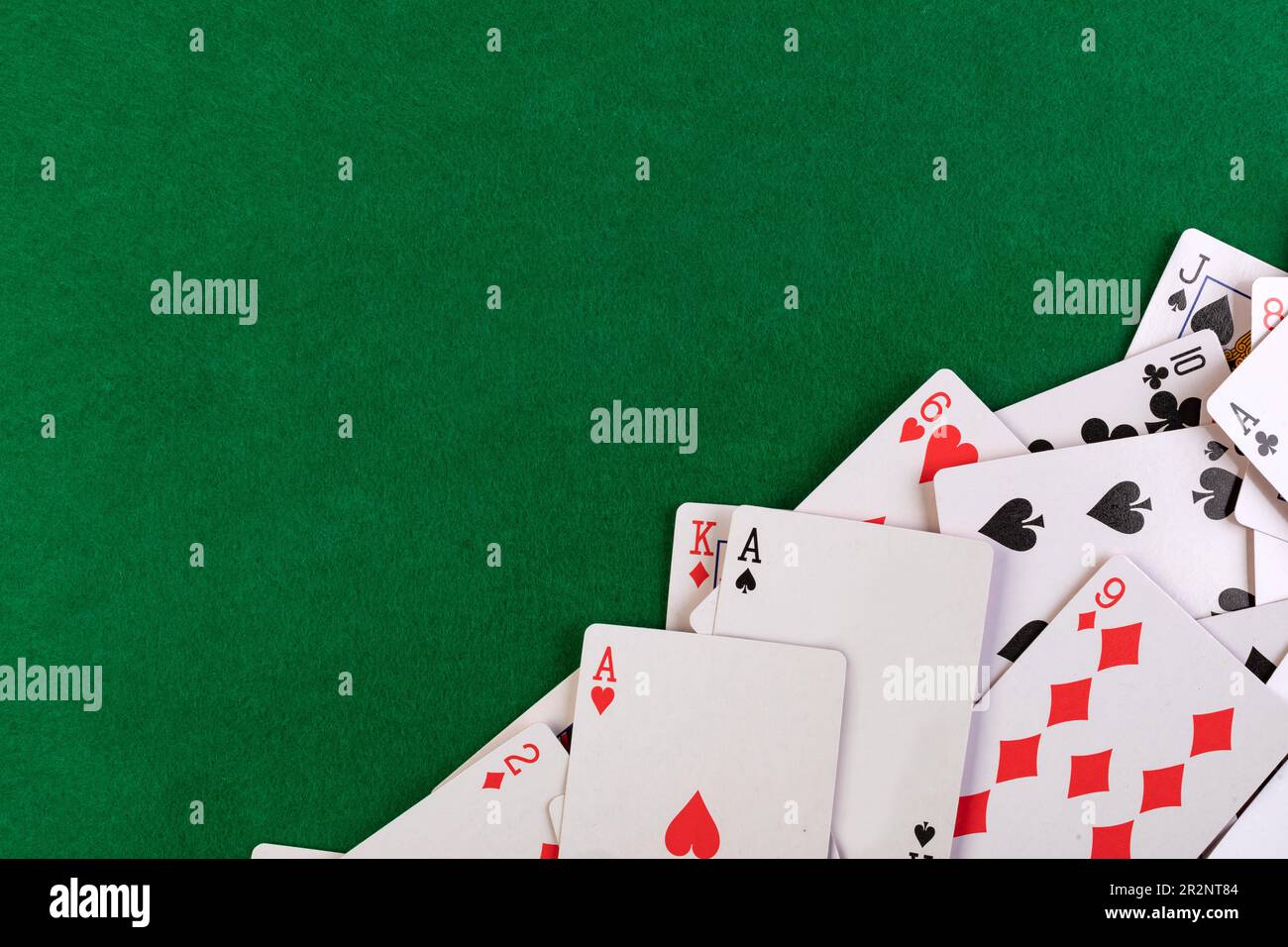 playing cards on green table in cacino Stock Photo - Alamy