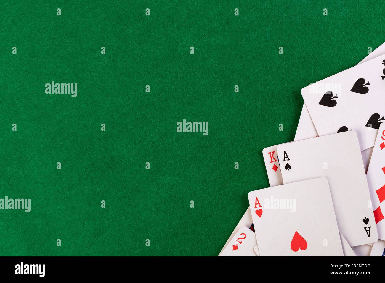 playing cards on green table in cacino Stock Photo - Alamy