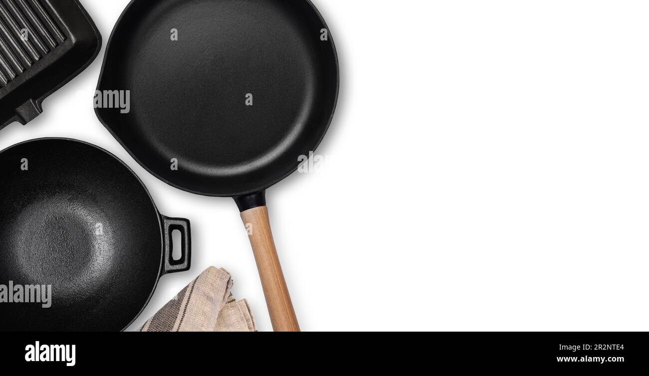 Empty cast iron frying pan on white background, view from above. Food ...