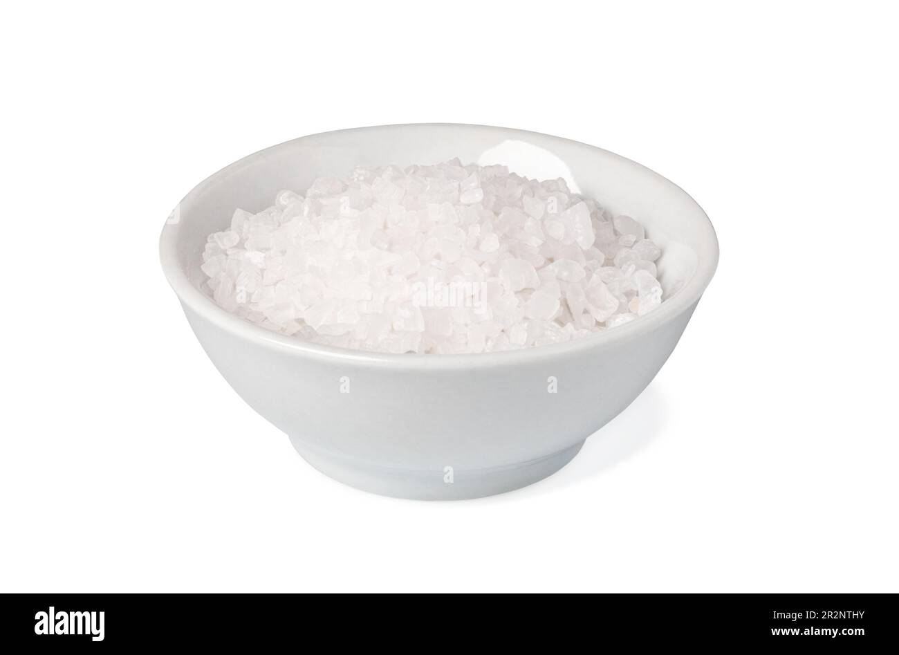 bowl of coarse grained salt isolated on white background Stock Photo ...