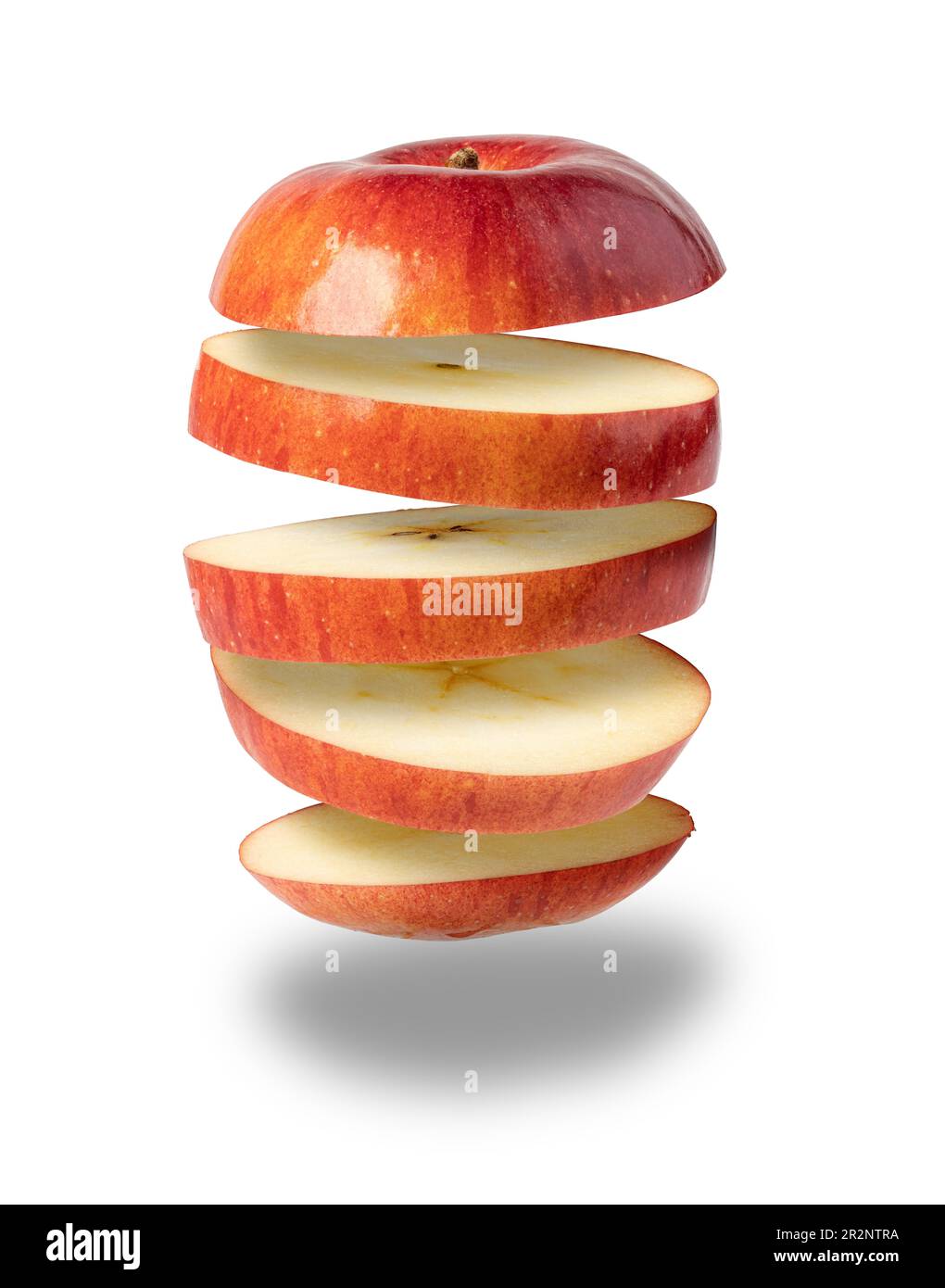Flying apple. Sliced red apple isolated on white background Stock Photo ...