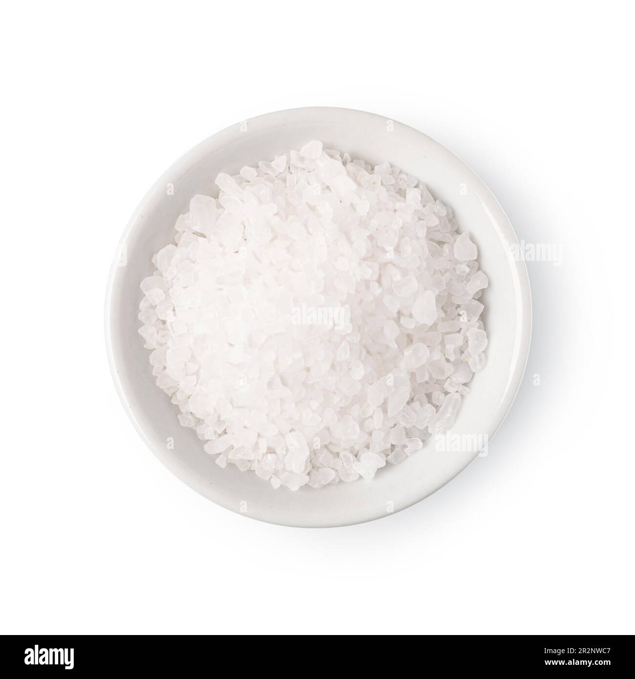 bowl of coarse grained salt isolated on white background Stock Photo ...