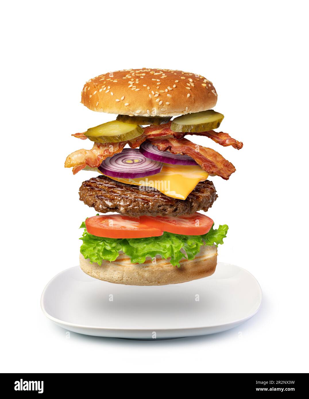 Flying burger isolated on a white background Stock Photo - Alamy