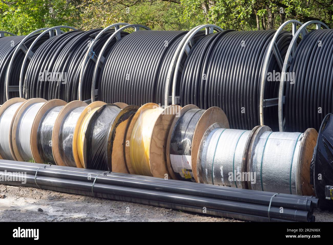 rolls of fiber optic cables on constructionsite Stock Photo - Alamy