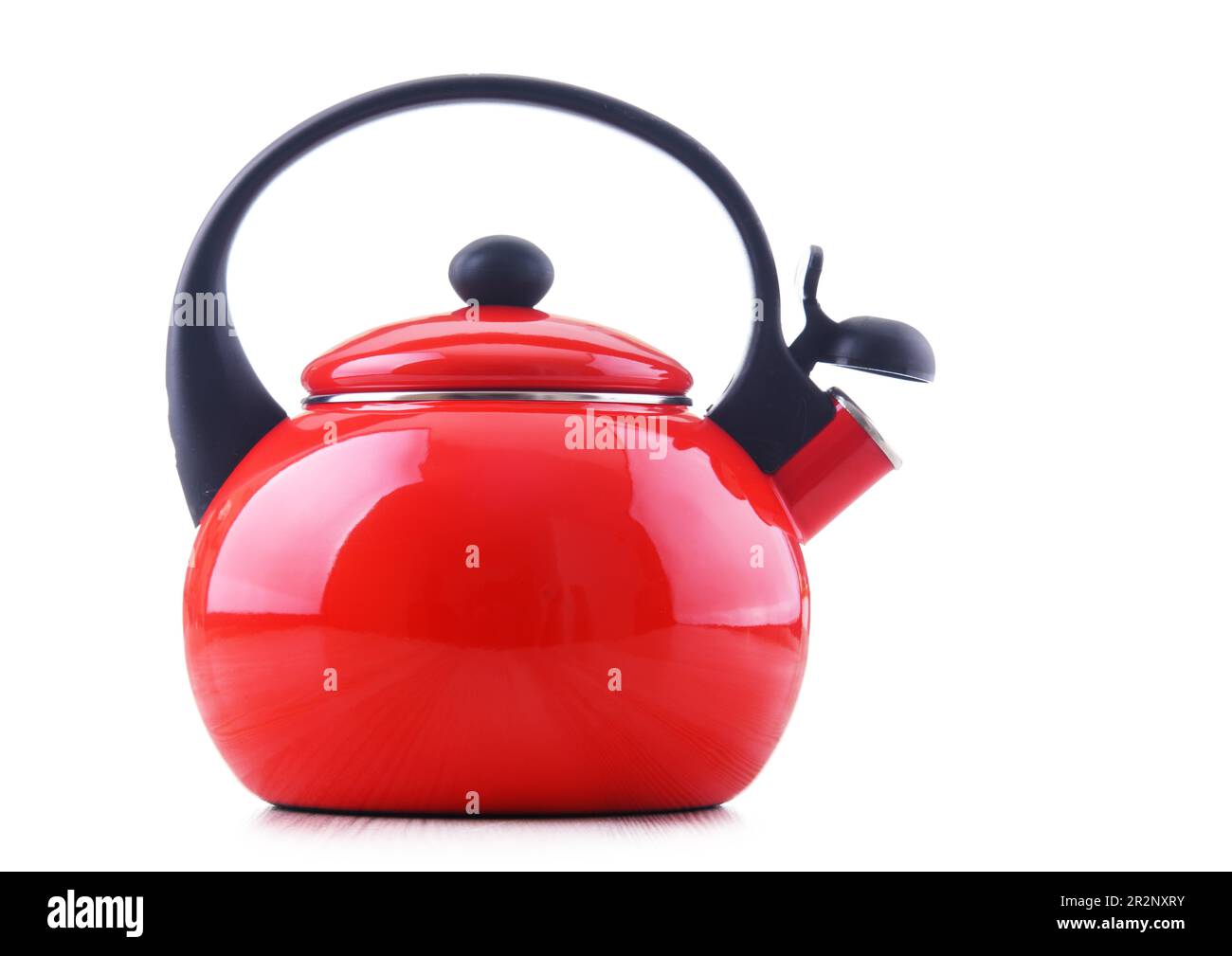 Traditional stainless steel stovetop kettle with whistle isolated on ...