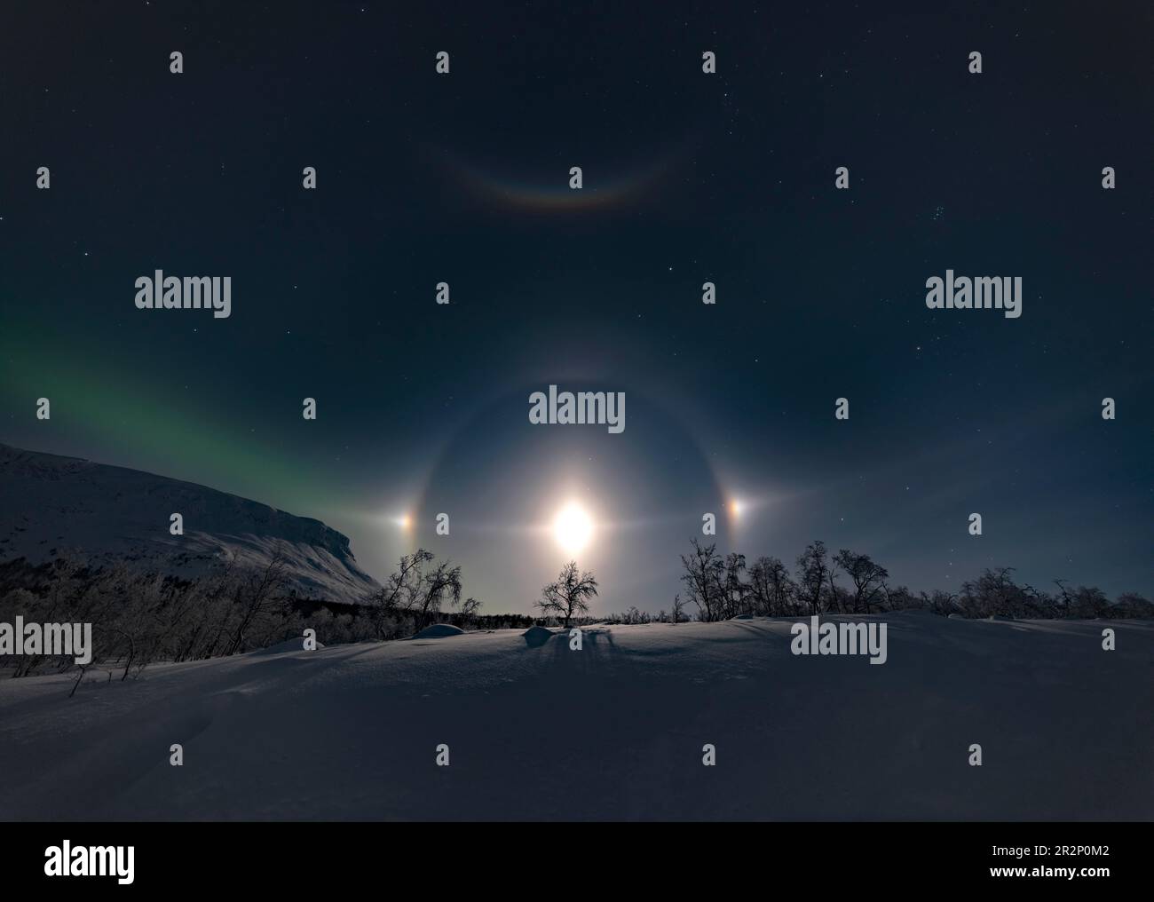 Diamond Moon with Moon dogs and Northern Lights Stock Photo - Alamy