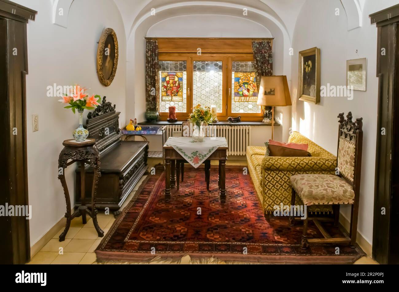 Bay window in corridor, corridor, leaded glass window, sofa, table ...