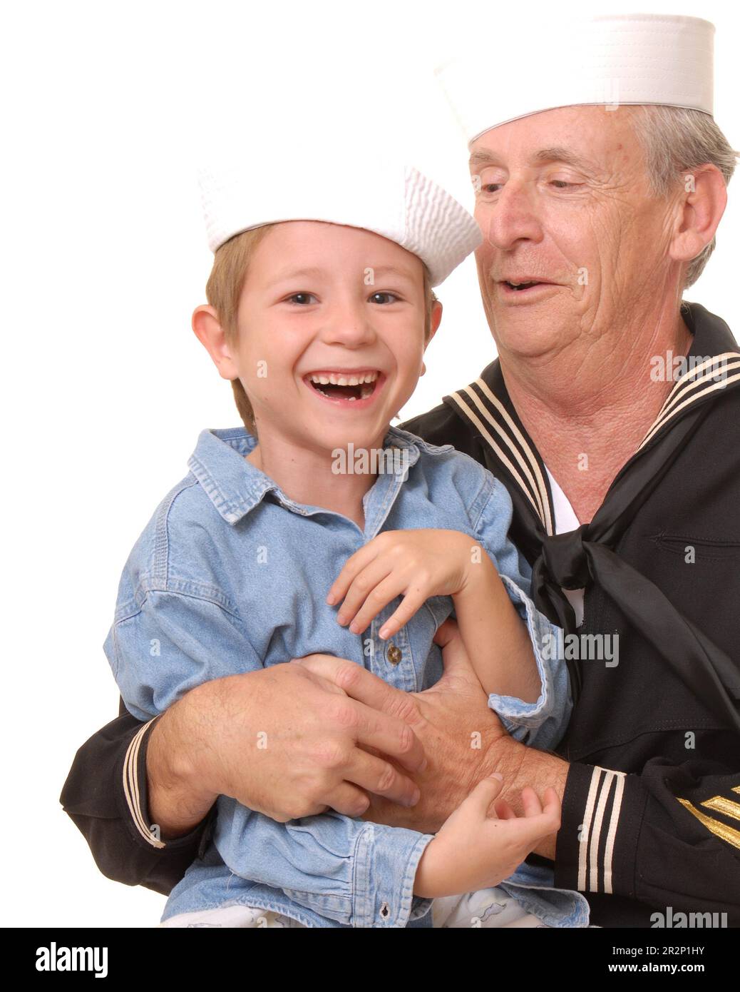 Old U.S. Navy sailor with his son Stock Photo - Alamy