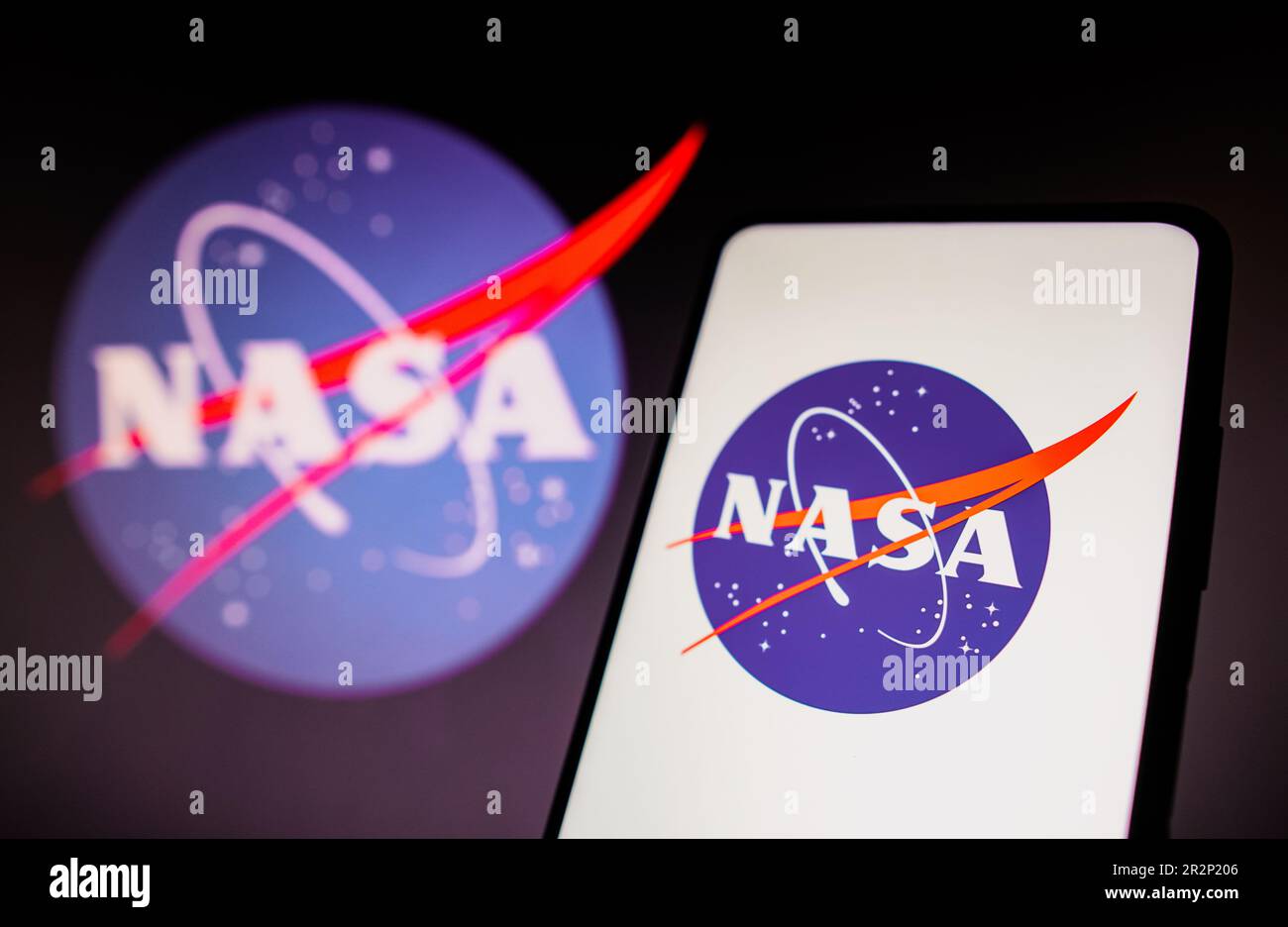 In this photo illustration, the NASA logo is displayed on a smartphone ...