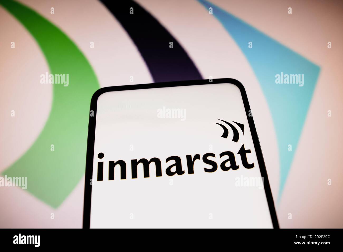 In this photo illustration, the Inmarsat logo is displayed on a ...