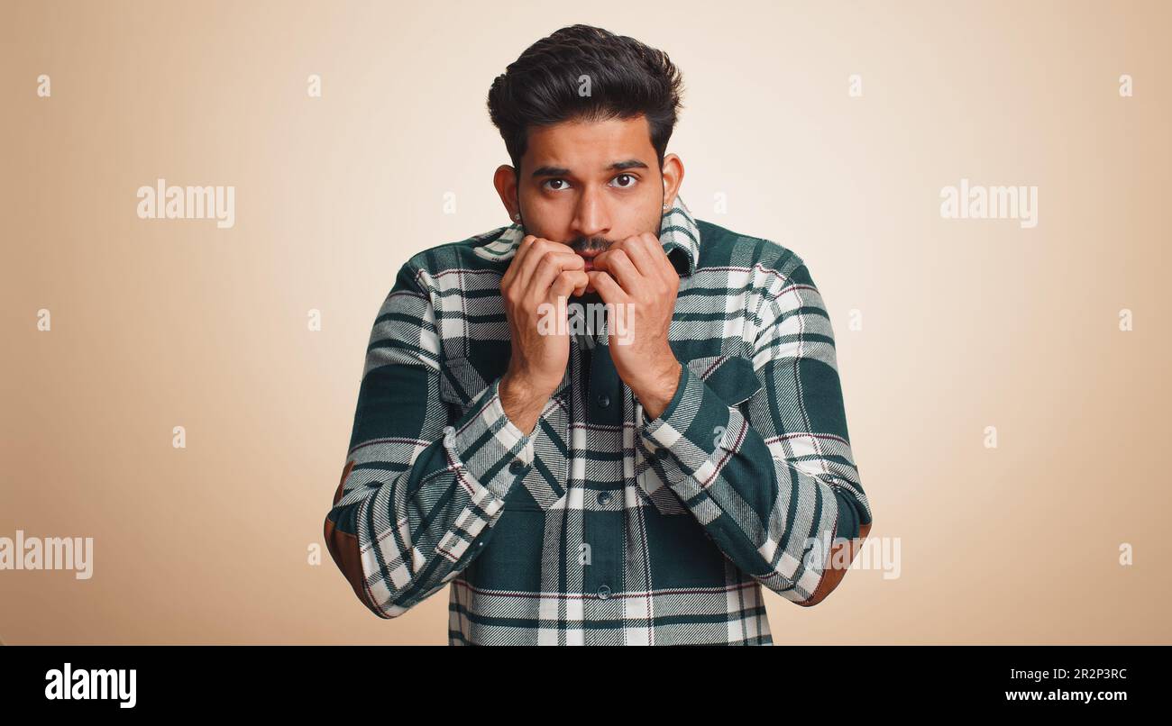Stressed depressed indian man terrified about danger problems ...