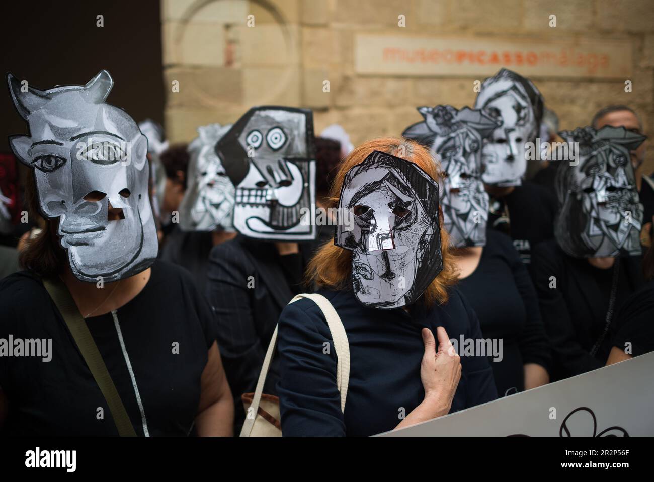 Malaga, Spain. 20th May, 2023. Protesters wearing masks depicting ...