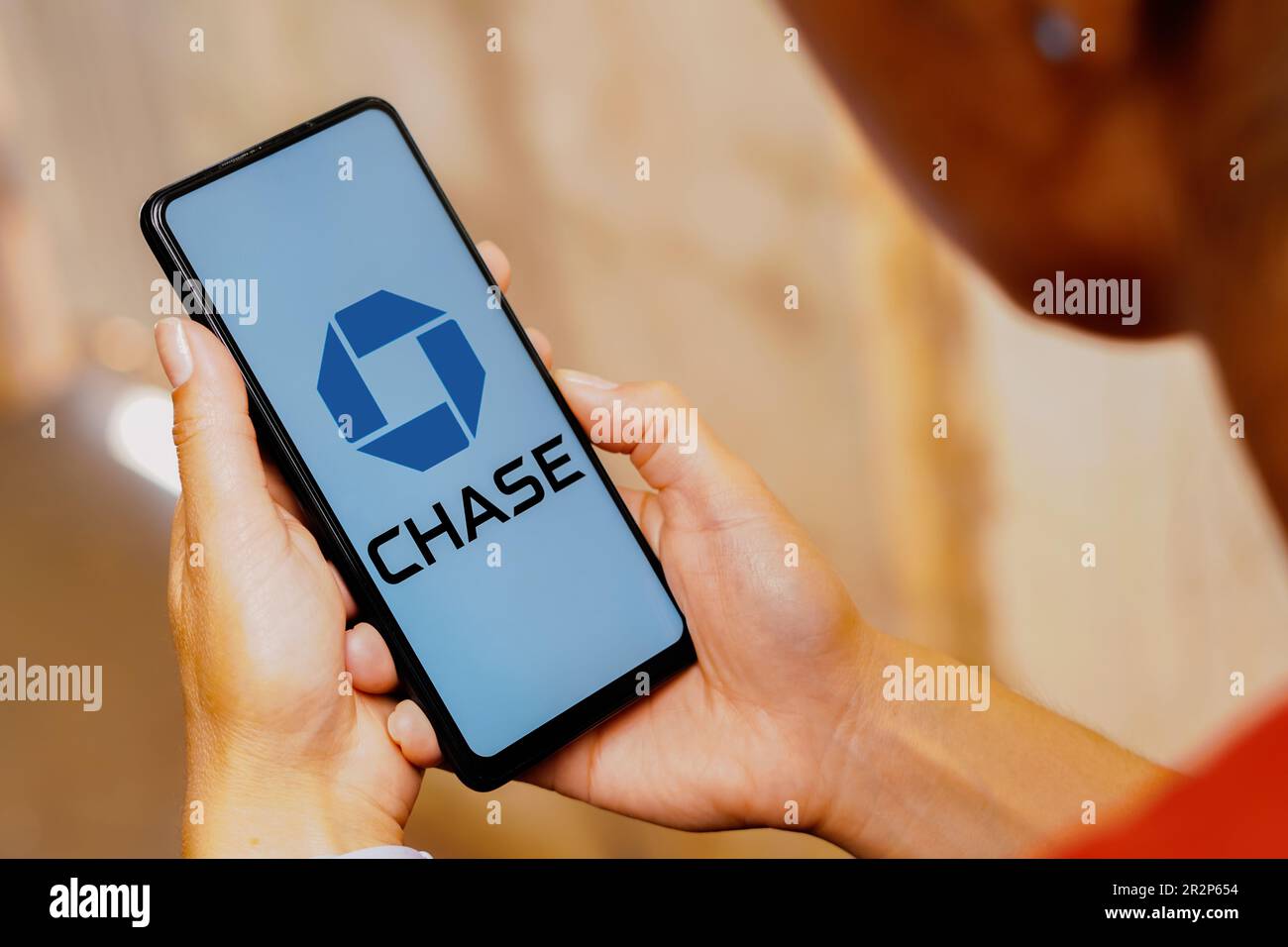 In this photo illustration, the Chase Bank logo is displayed on a ...